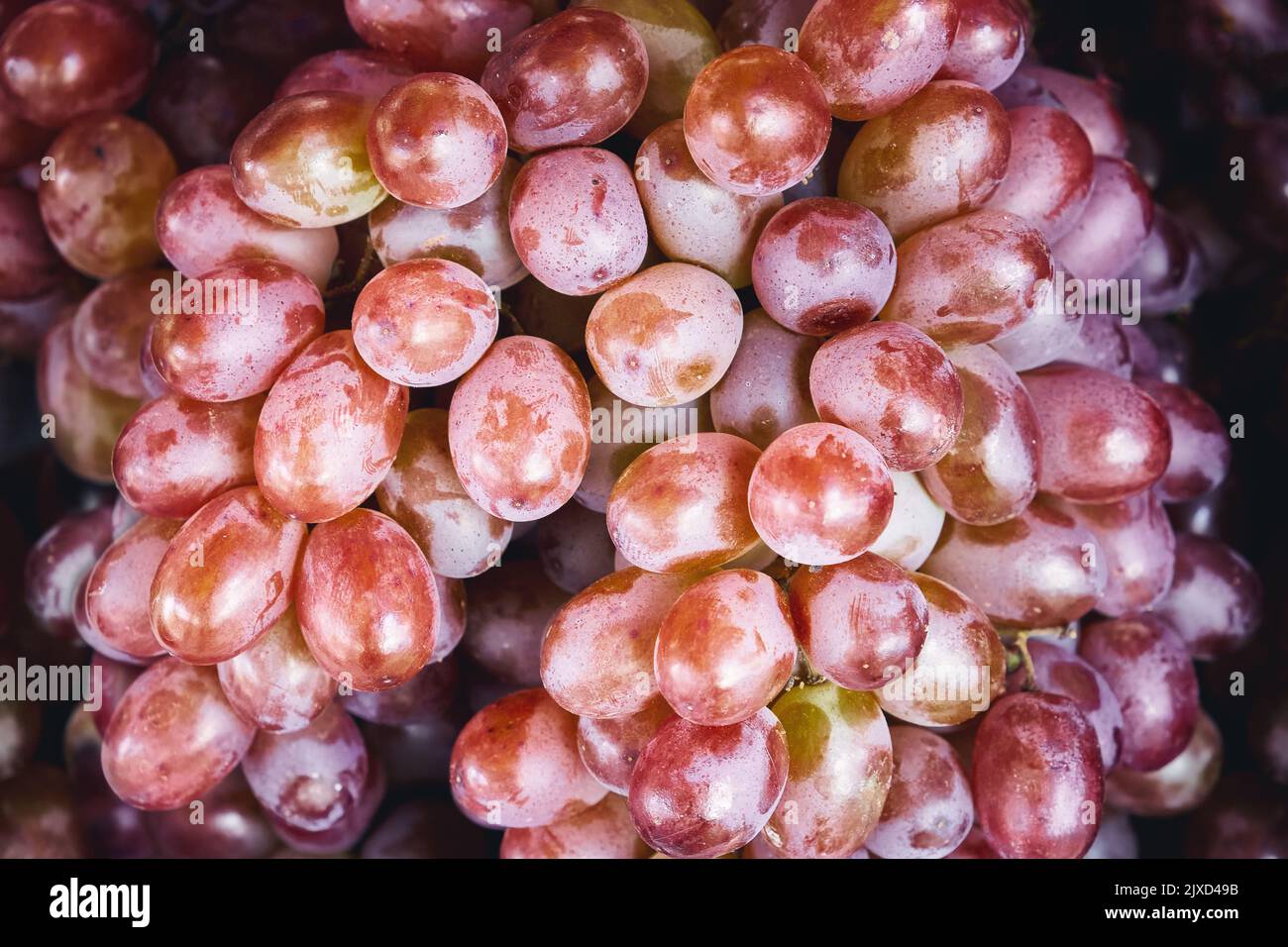 Ripe Red Grape Clusters Close-up at a street market natural Stock Photo ...