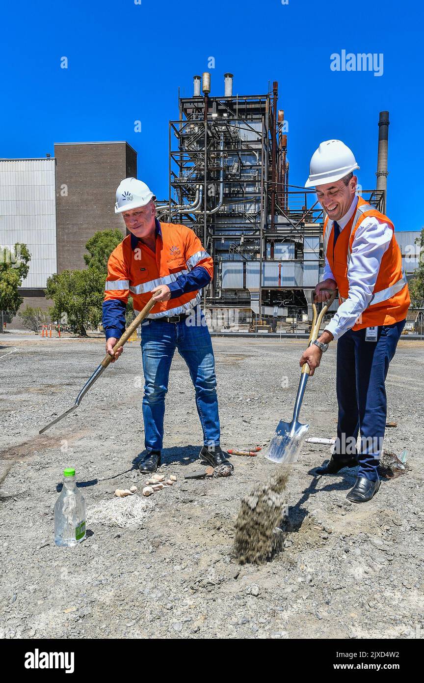 Energy Minister Tom Koutsantonis (right) and AGL CEO Andy Vesey turn ...