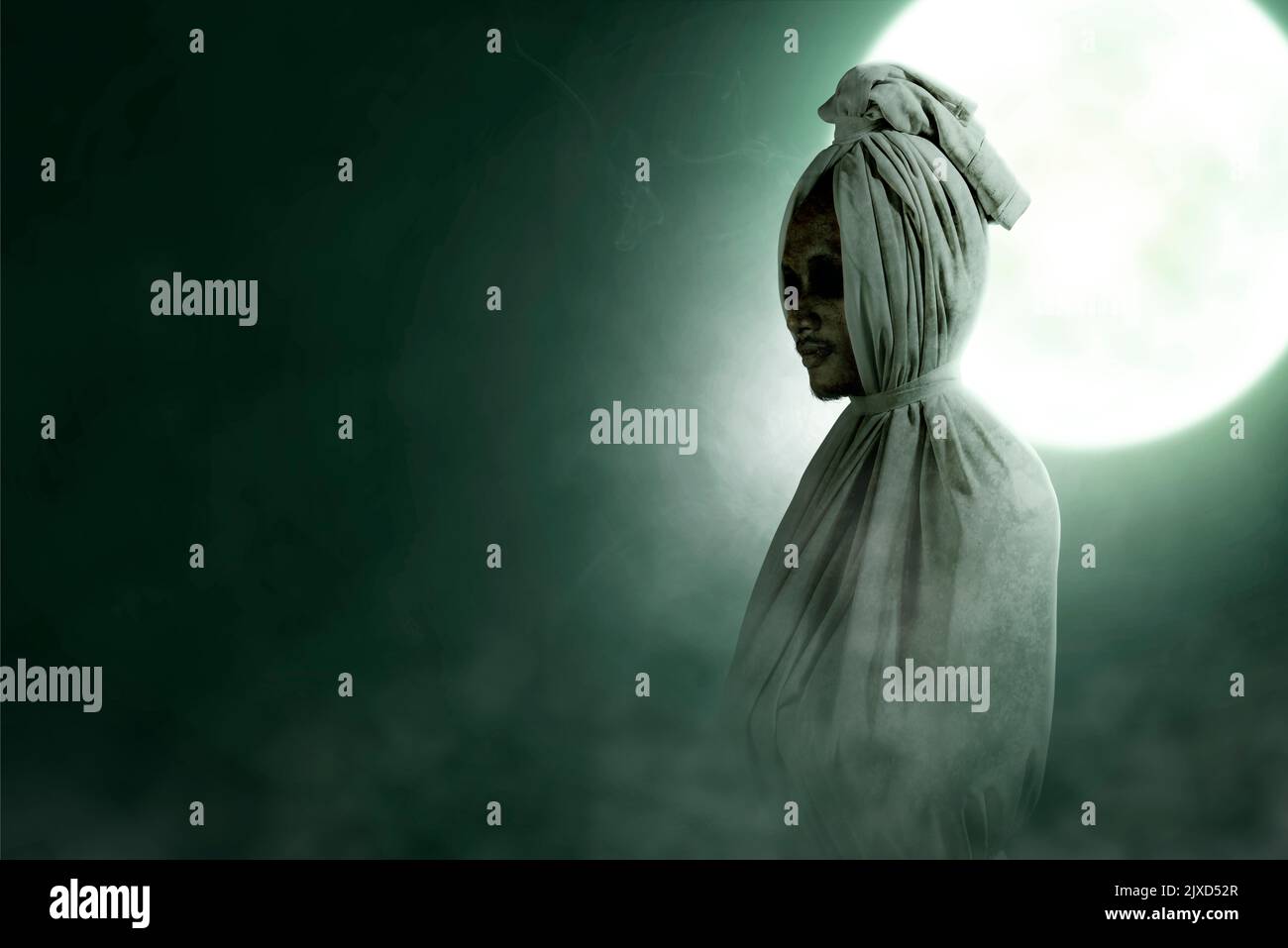 Pocong is covered with a white linen shroud standing with full moon ...