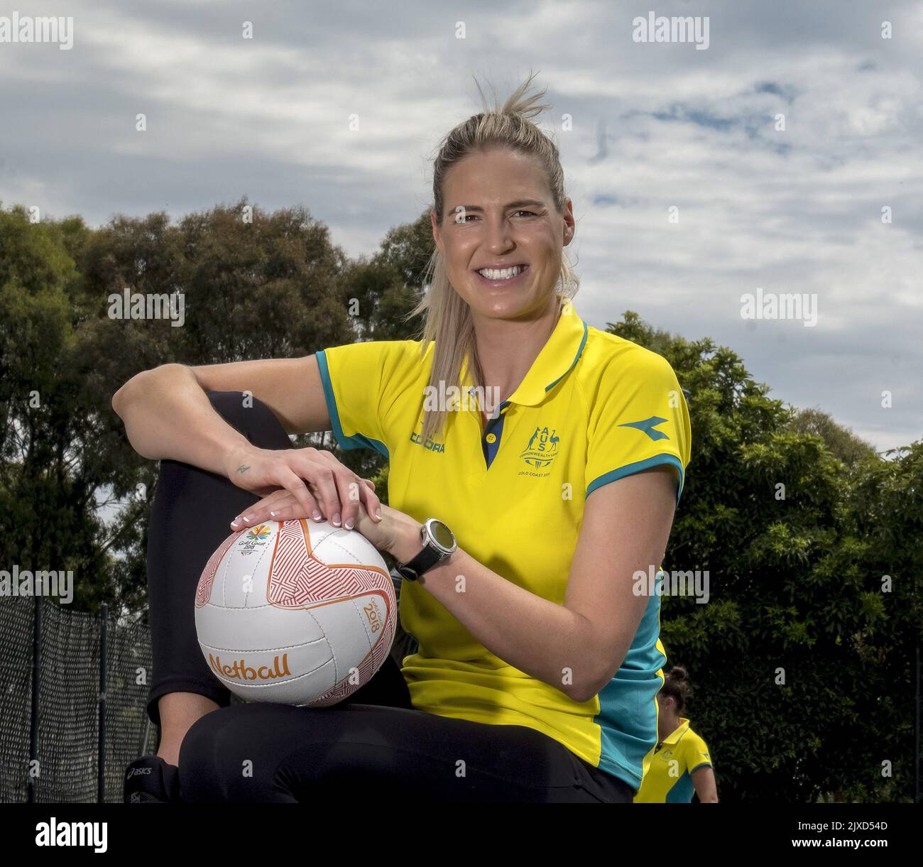 Caitlin Bassett poses for a photograph after being selected to play for ...