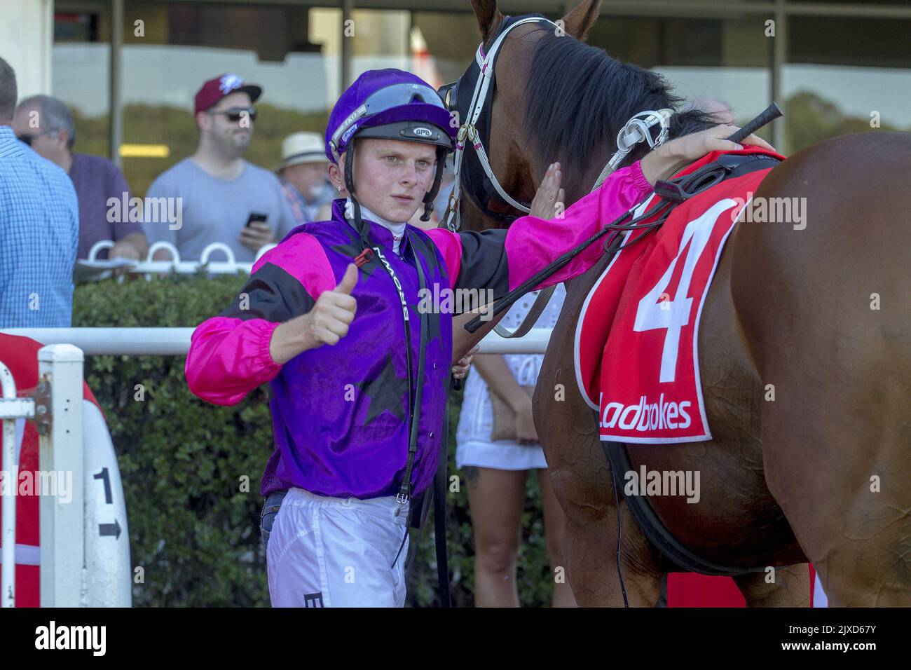 Jockey Ethan Brown gestures after riding Stylish Missile to win Race 4 ...