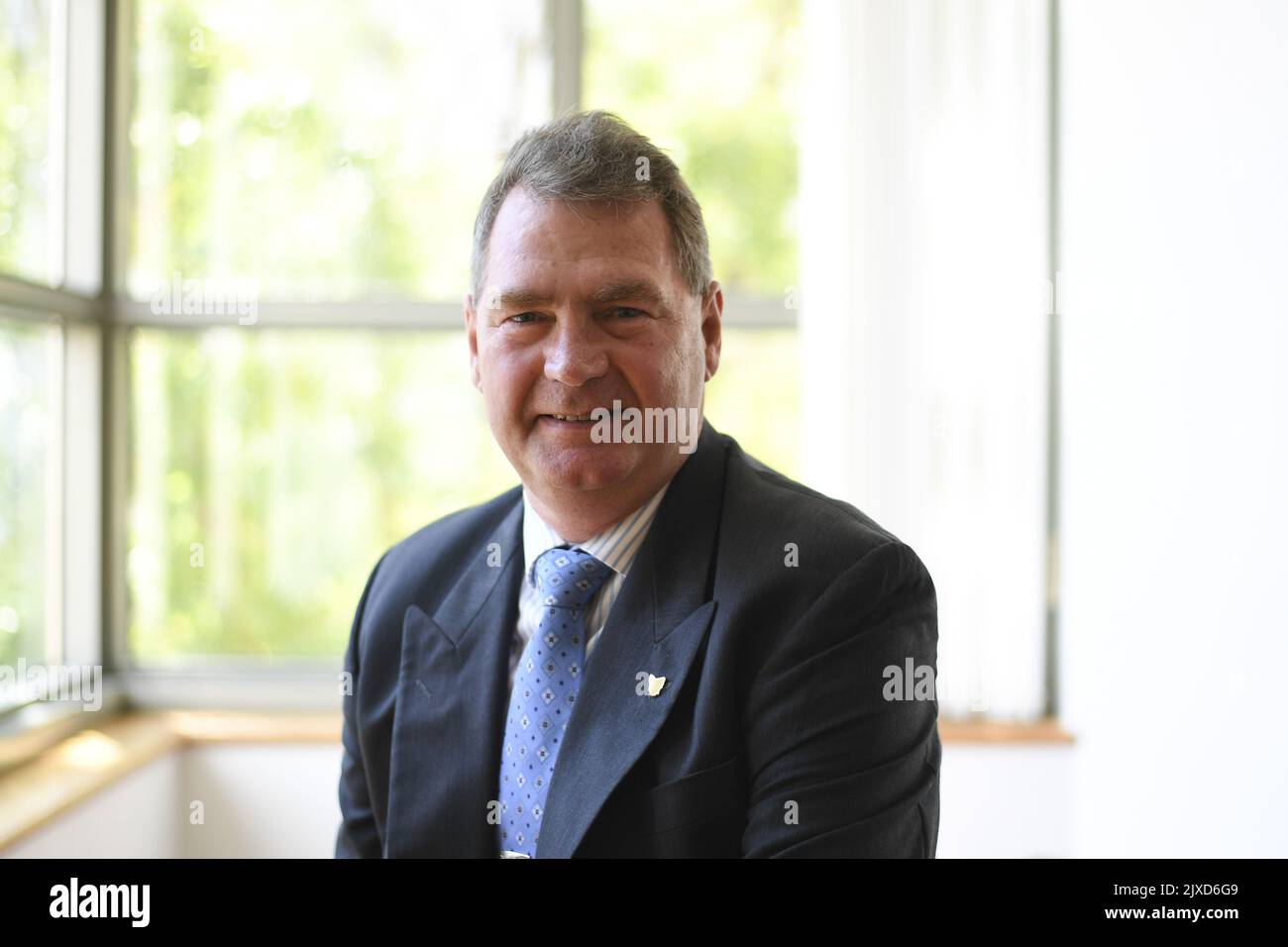 Tasmanian Senator-elect Steve Martin poses for photographs at ...