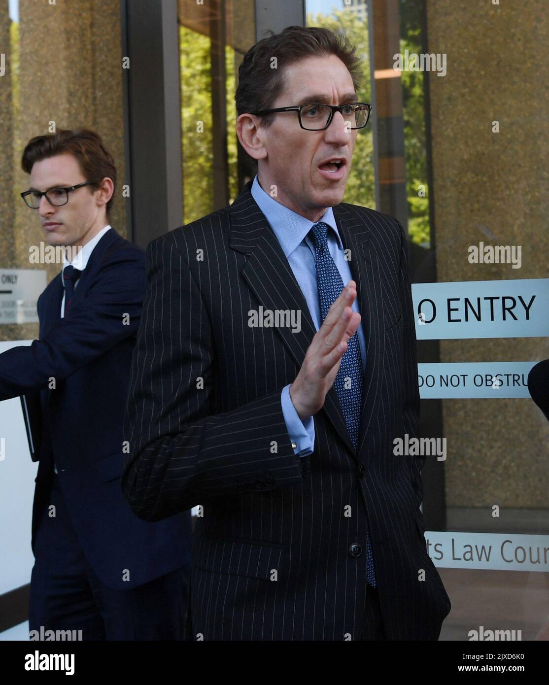 The barrister for actor Geoffrey Rush, Richard McHugh SC, gestures to ...