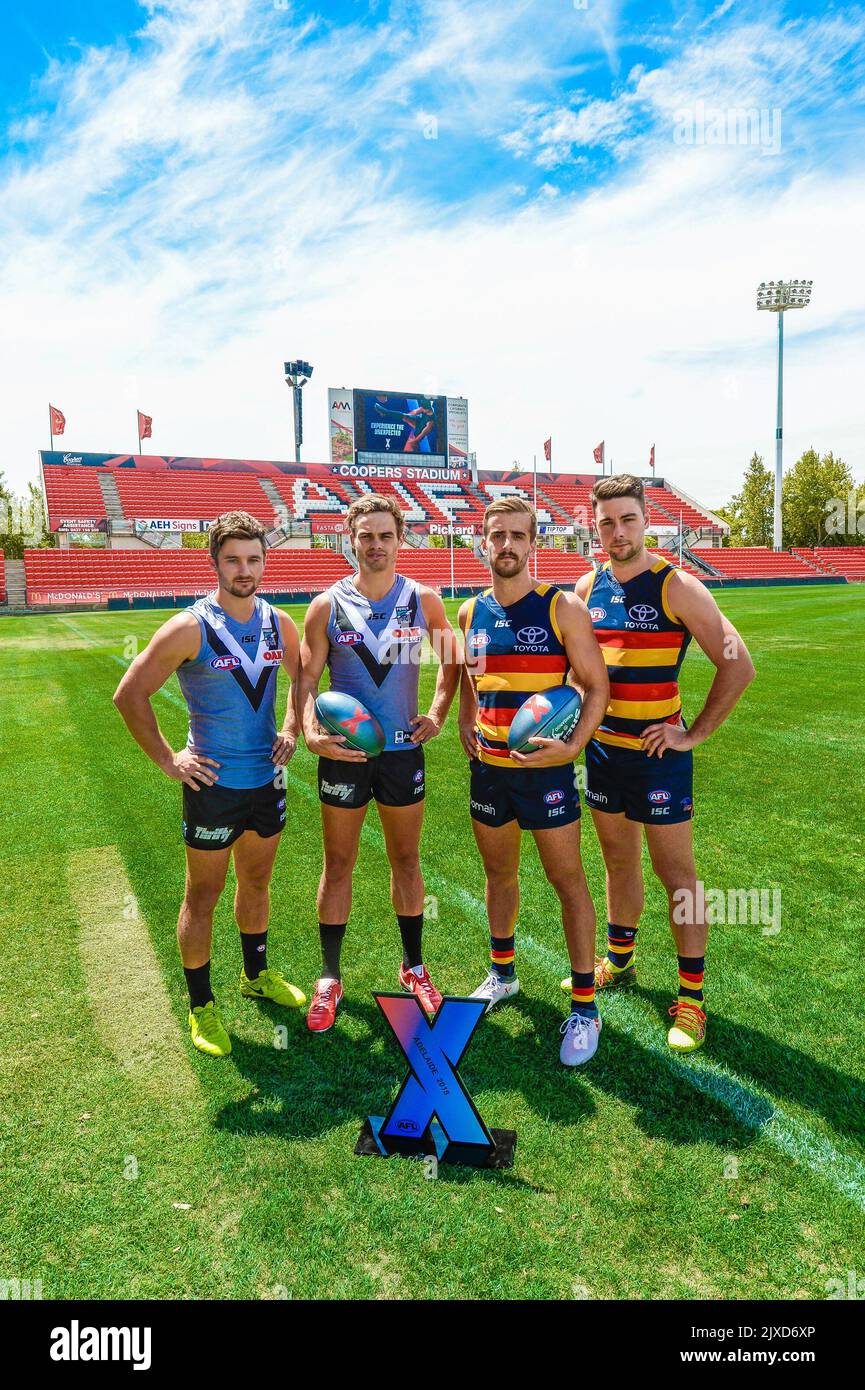 Sam Gray and Karl Amon of Port Adelaide and Jordan Galucci and Rory ...