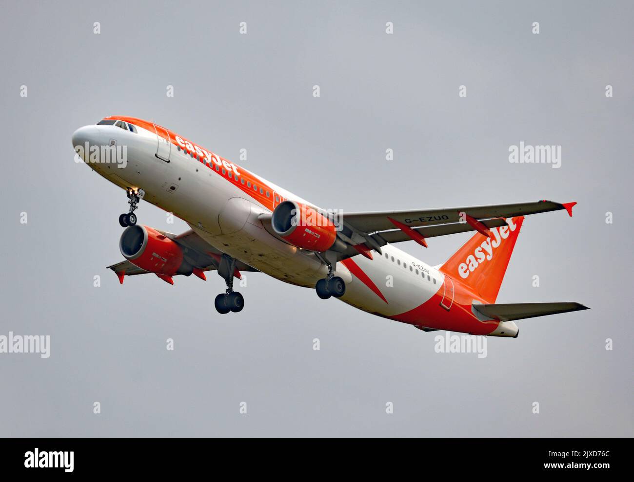 A easyJet Airbus A320-214 (G-EZUO) passenger airliner comes in to land ...