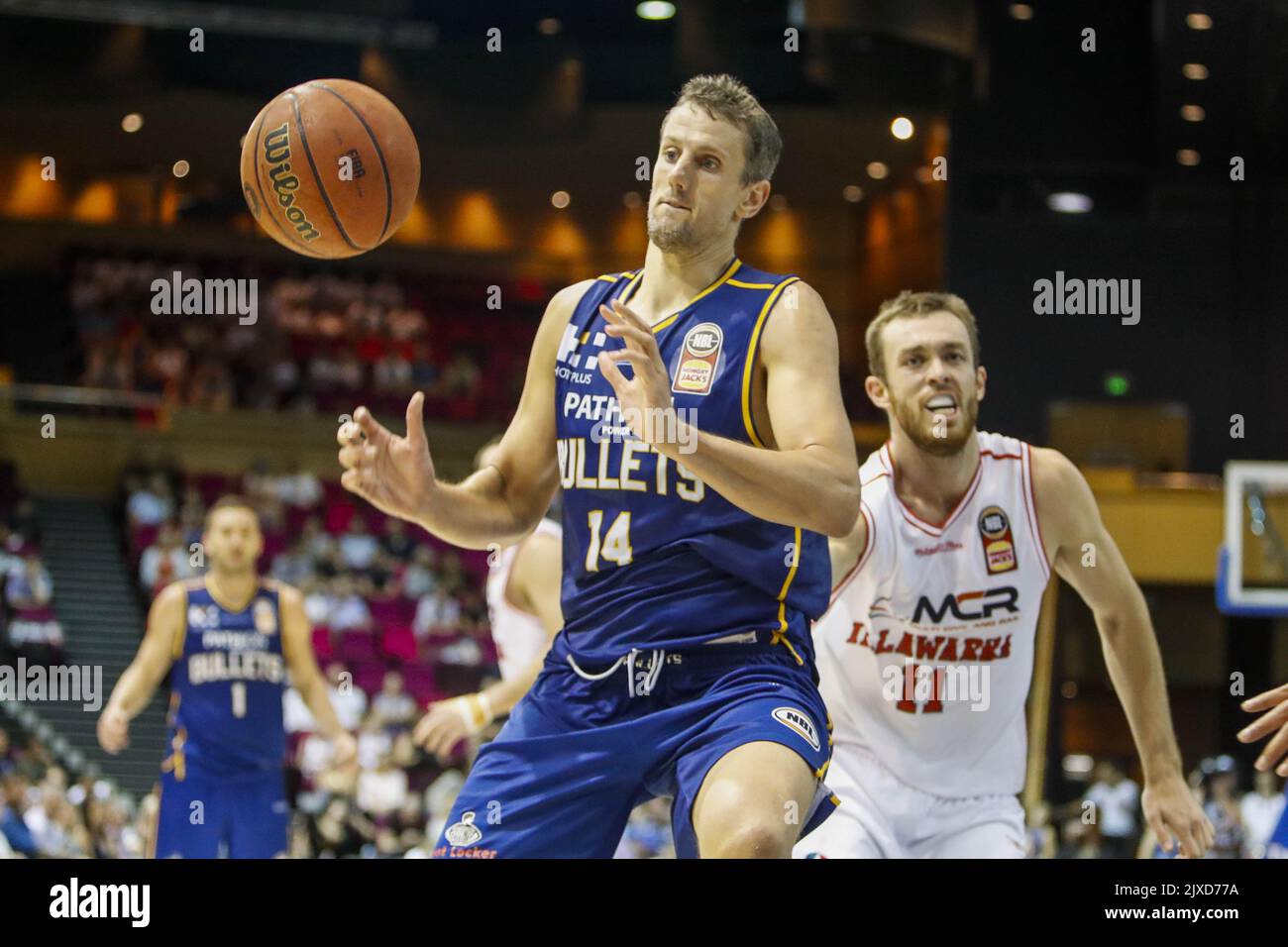 Daniel Kickert (left) of the Bullets loses control of the ball during ...
