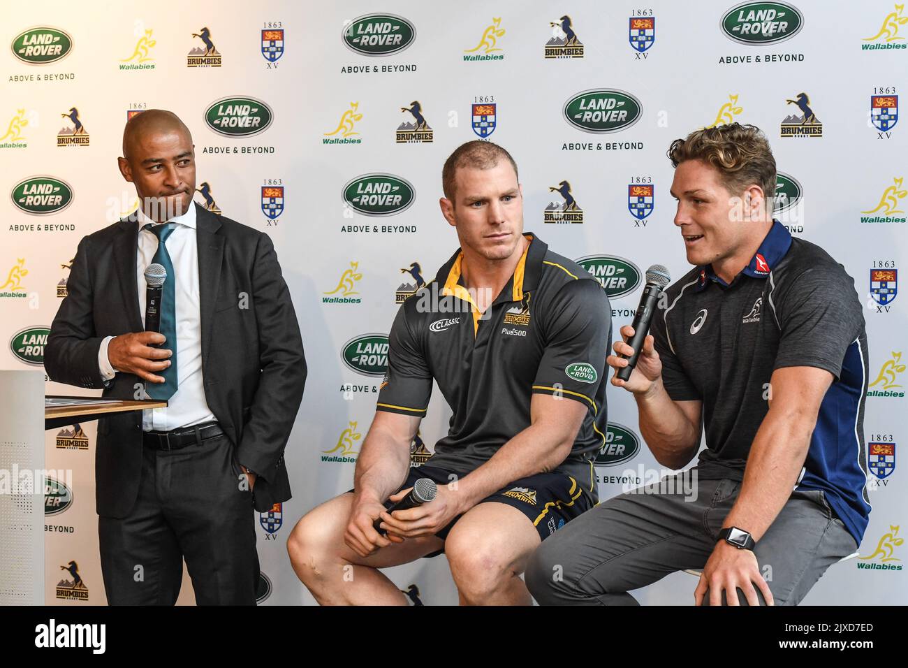 (L-R) Former player George Gregan, player David Pocock and Captain ...