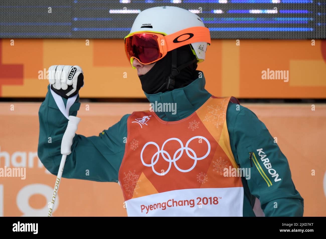 Matt Graham of Australia gestures following his run in the Moguls ...