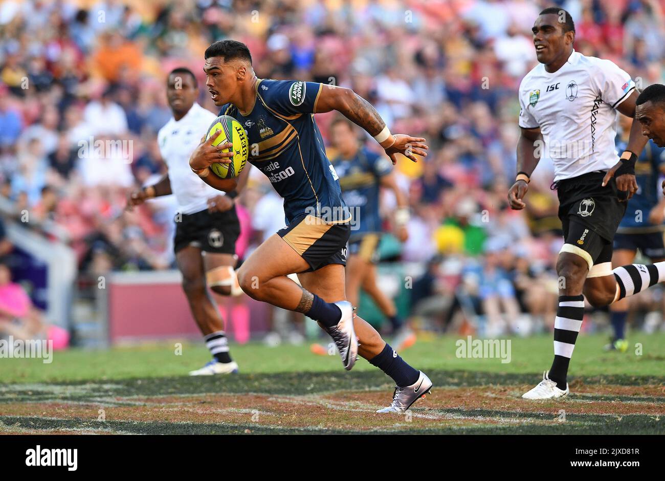 Chance Peni of the Brumbies crosses over for a try during the Global ...