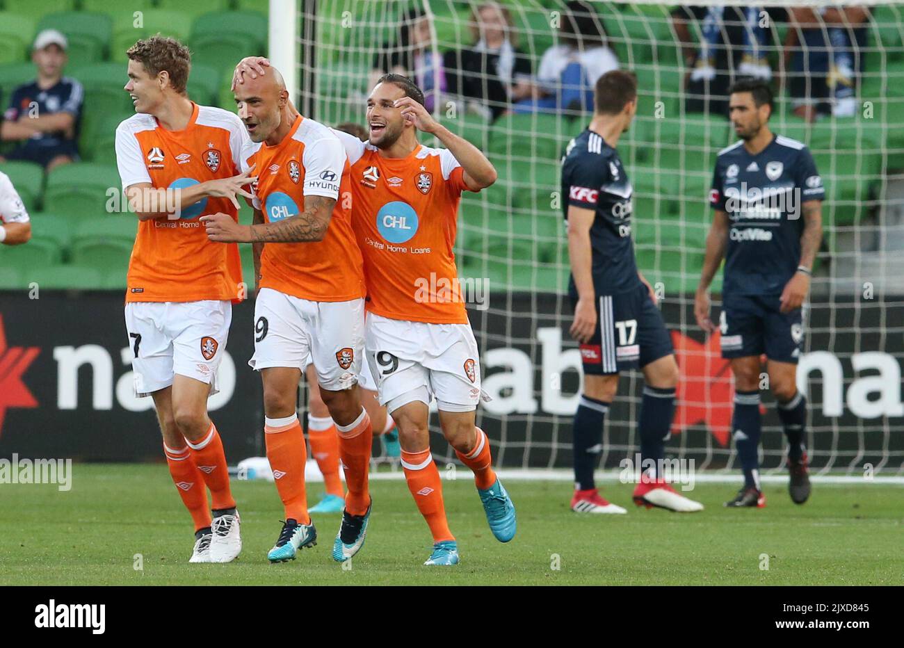 Brisbane Roar celebrate after Massimo Maccarone (2nd left) scores a ...