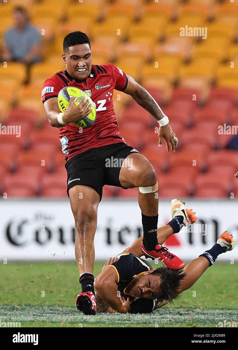 Crusaders player Tima Faingaanuku evades a tackle during the Global ...