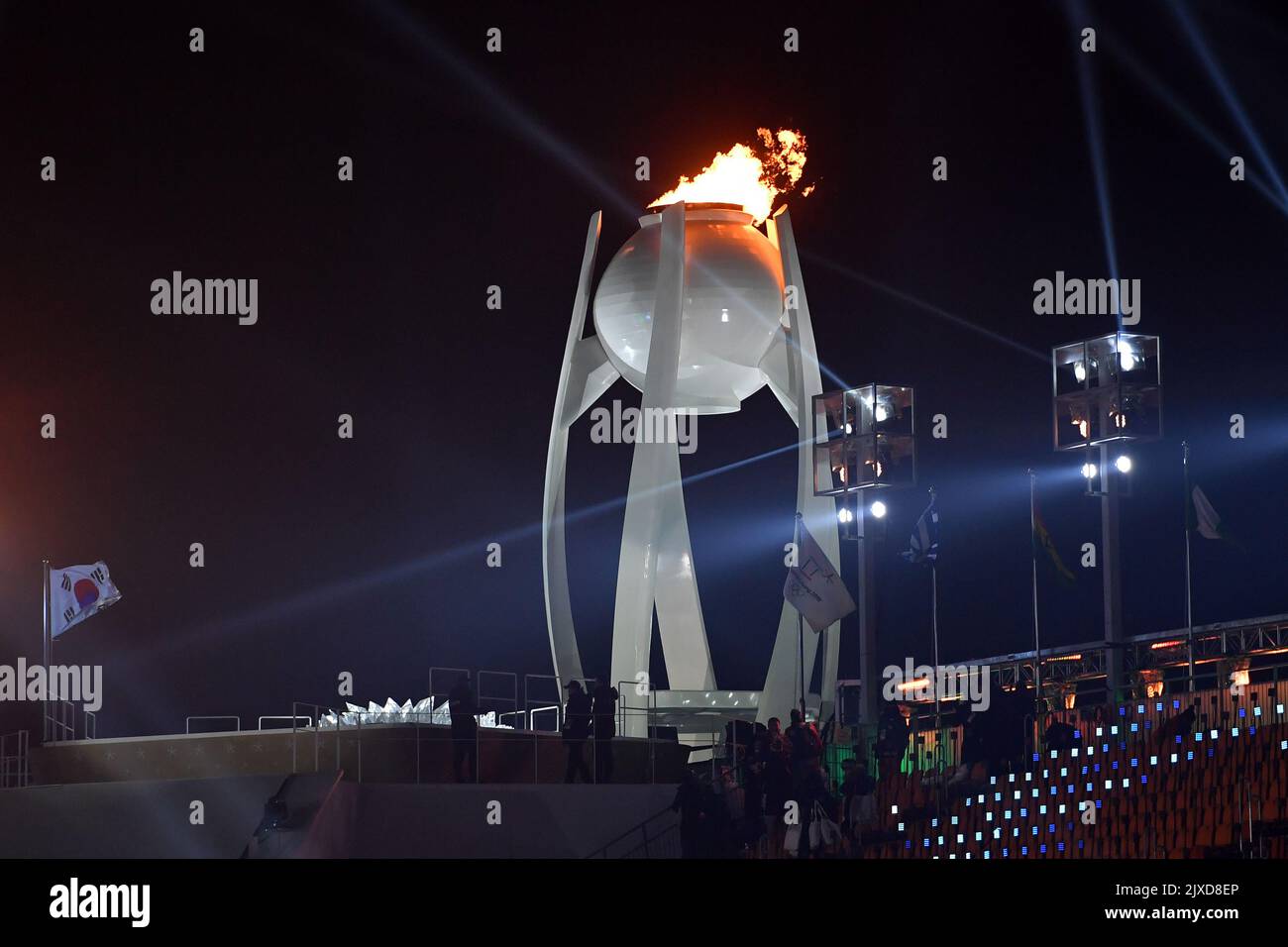 The Olympic cauldron is seen alight following the Opening Ceremony of ...