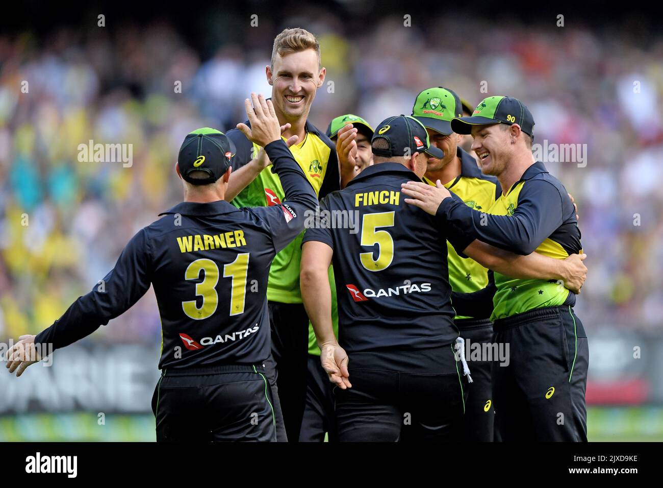 Aaron Finch of Australia celebrates with teammates after catching the ...