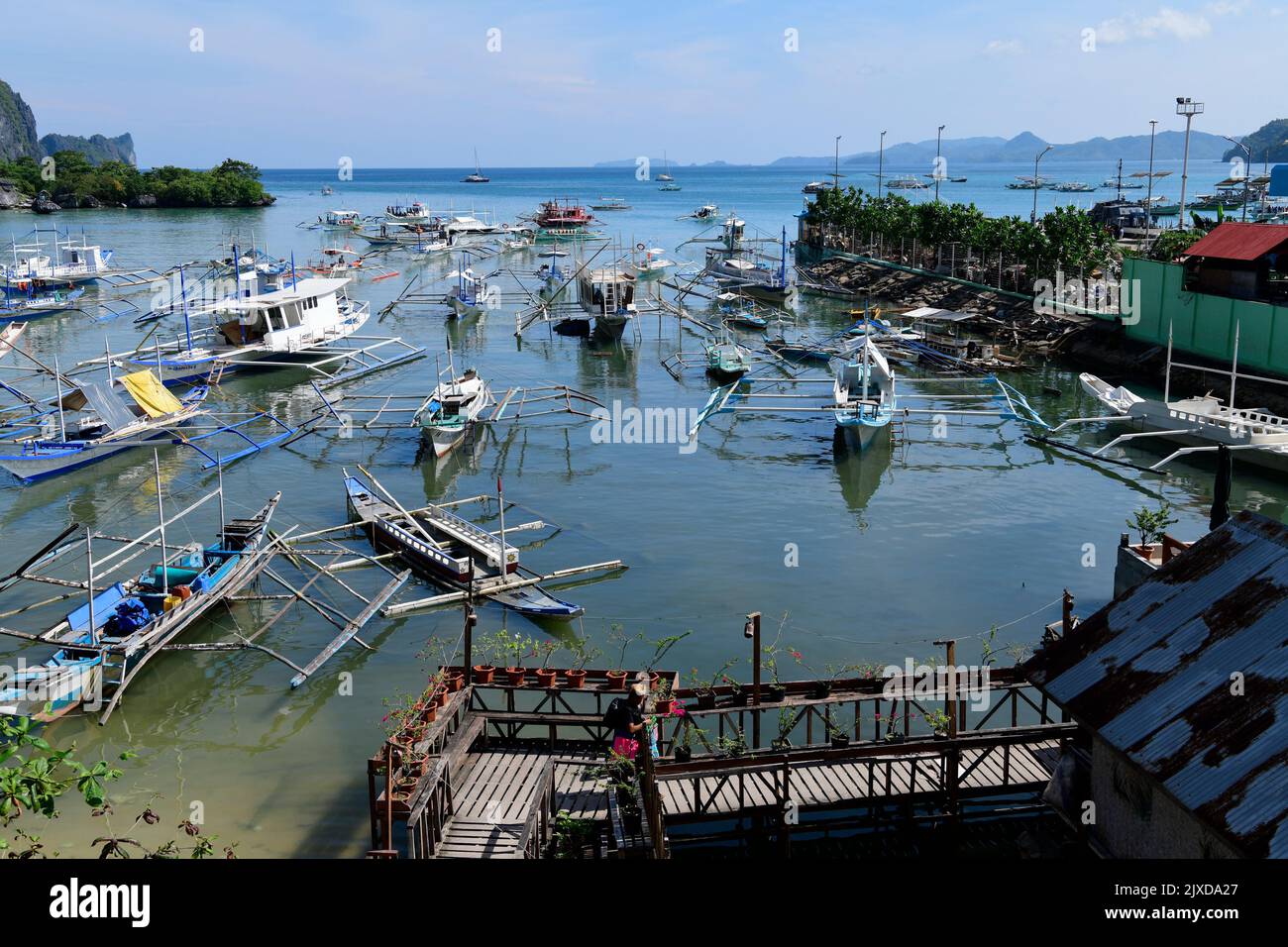 Traditional boats, balangay, in El Nido on Pinagbuyutan island, natural ...