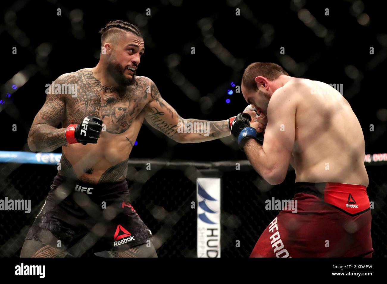 Tyson Pedro (left) from Australia and Saparbek Safarov from Russia in ...