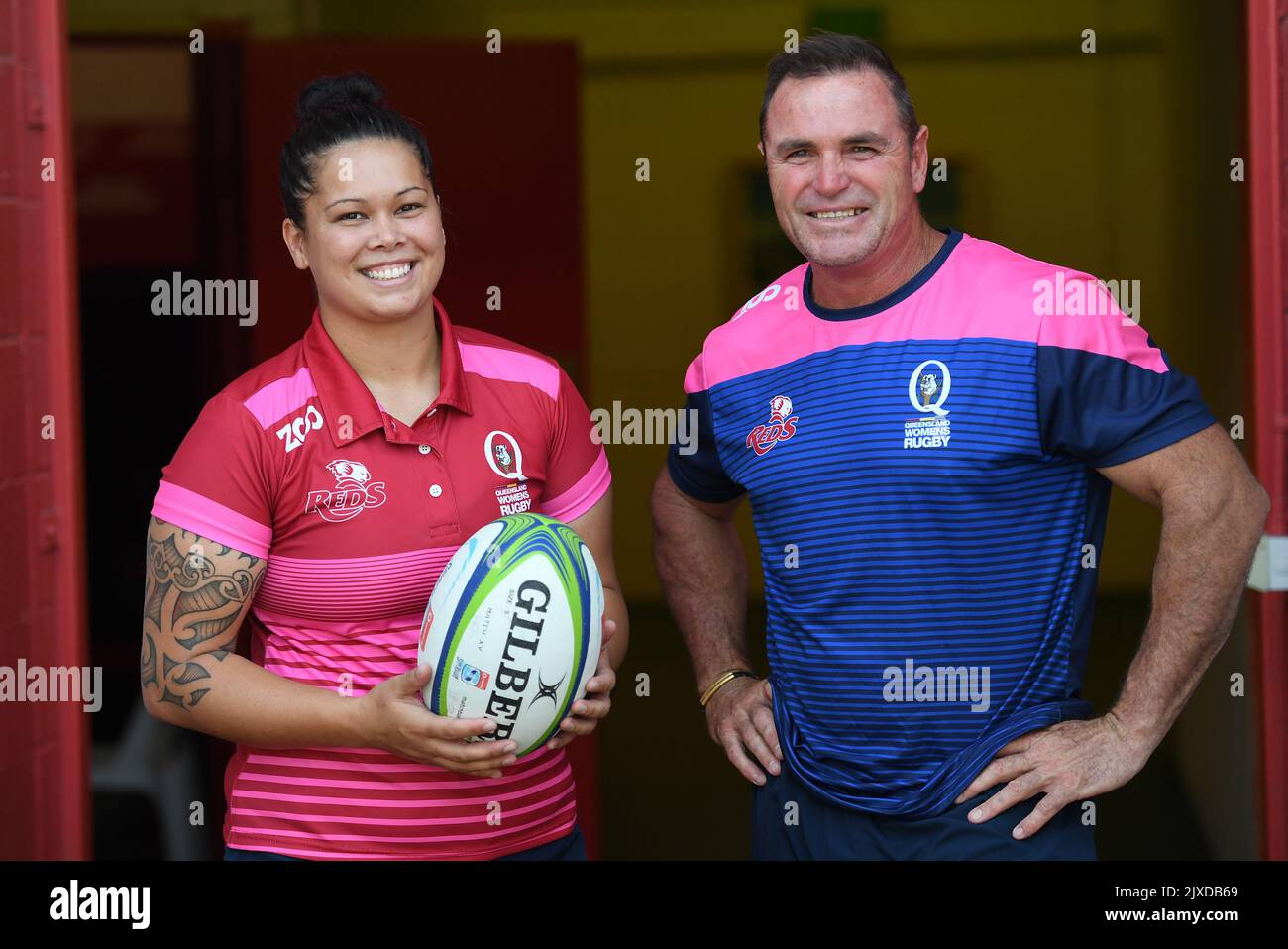 Queensland Women's XV centre Sarah Riordan and Coach Michael Hayes pose ...
