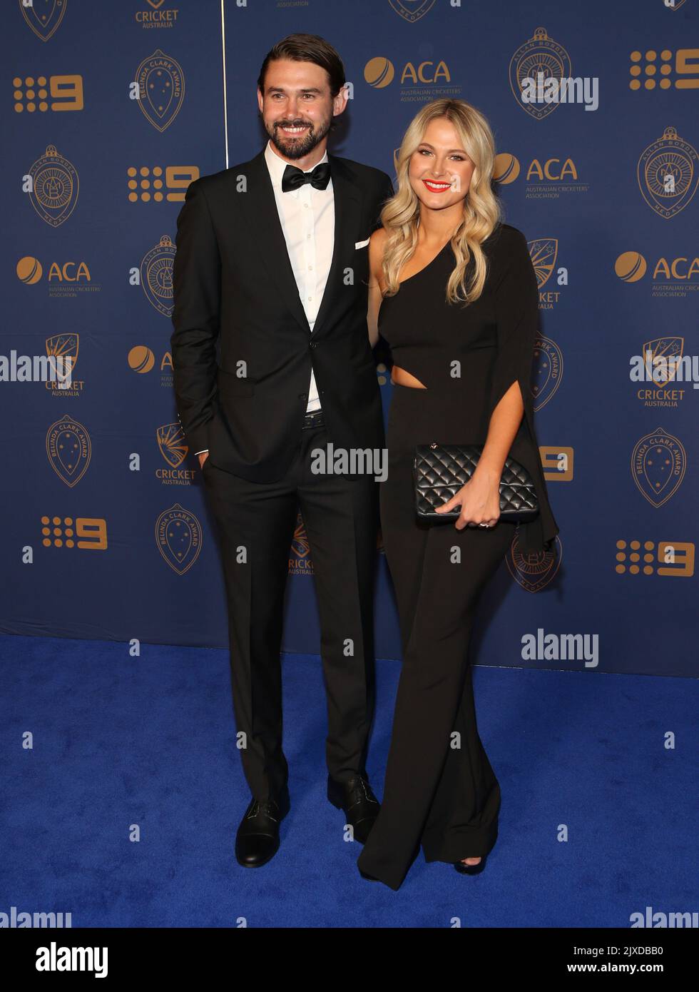 Cricket player Kane Richardson and Nicole Kitching pose for a ...