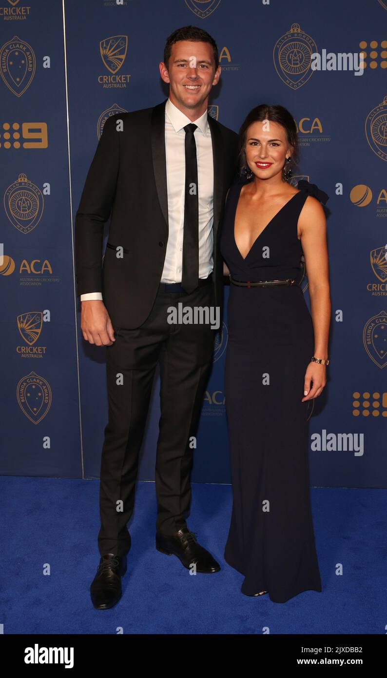 Cricket player Josh Hazlewood and his partner Cheri Christian pose for ...