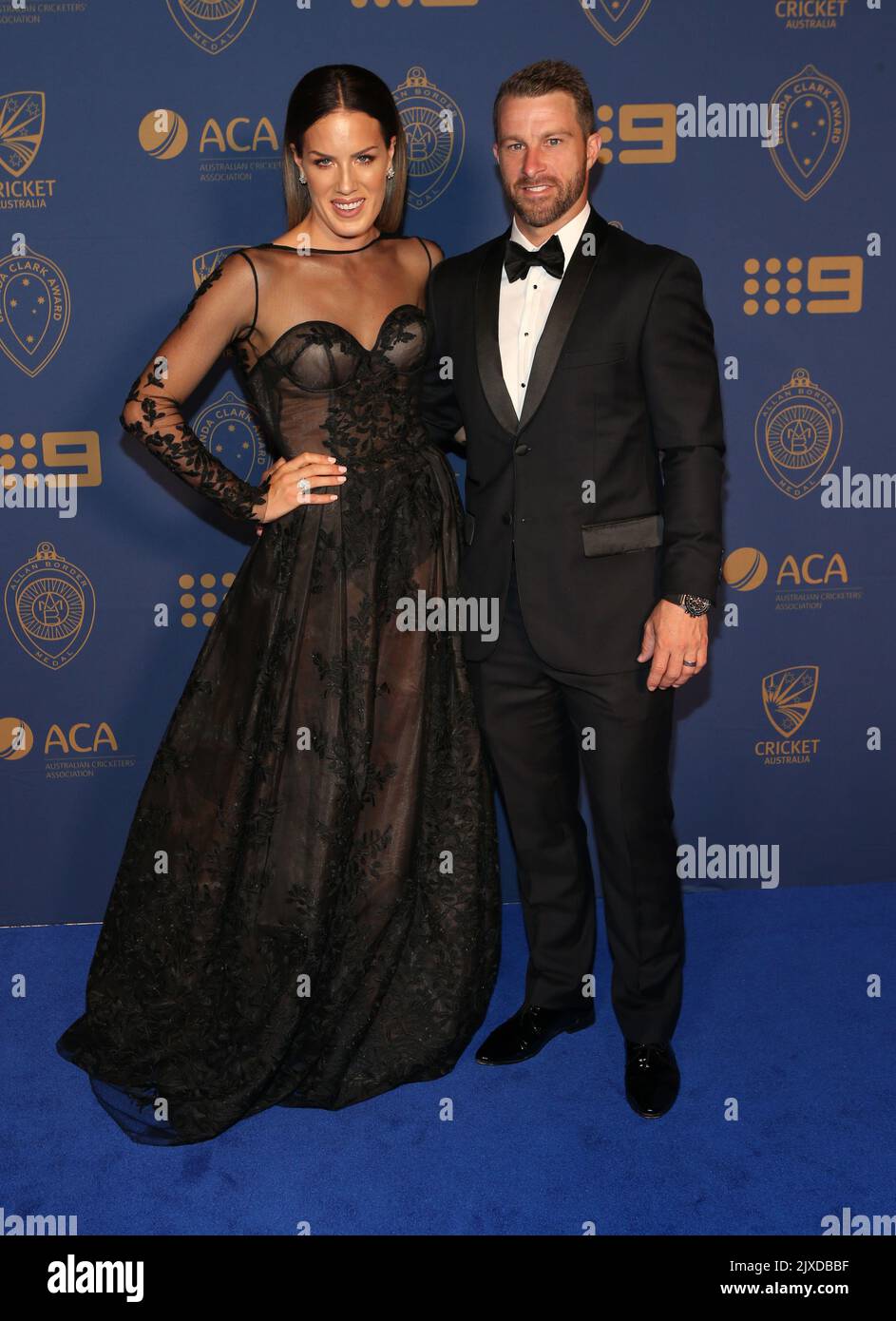 Cricket player Matthew Wade and his wife Julia Wade pose for a ...