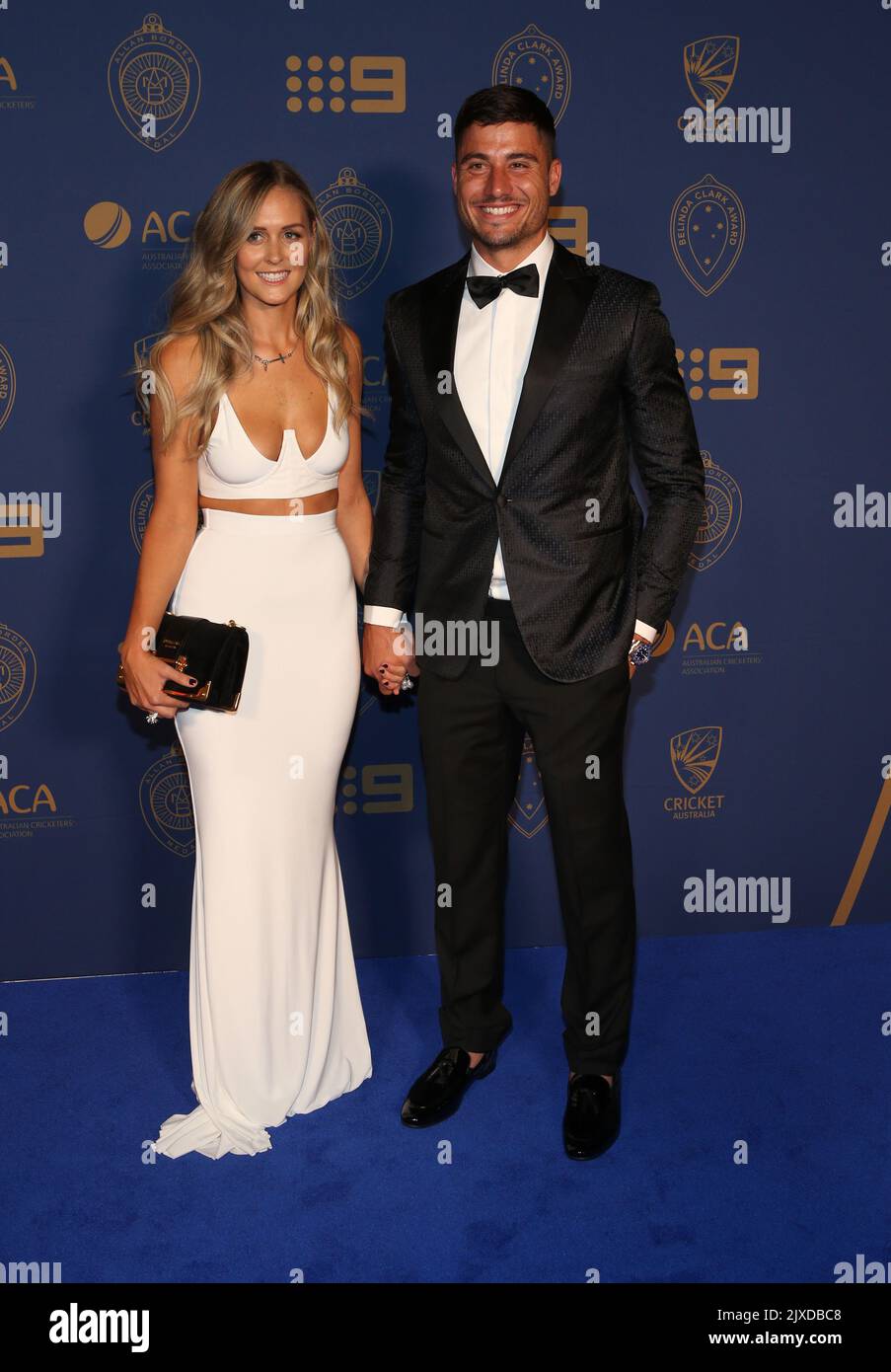 Cricket player Marcus Stoinis and his partner Stephanie Muller pose for ...