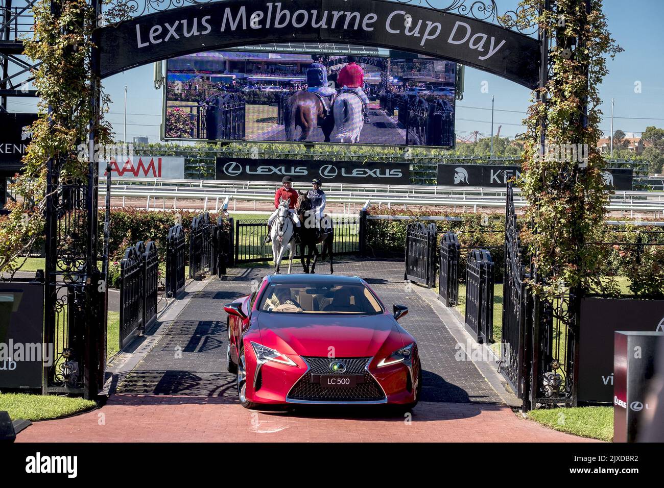 International racing expert Francesca Cumani rides a horse behind the ...