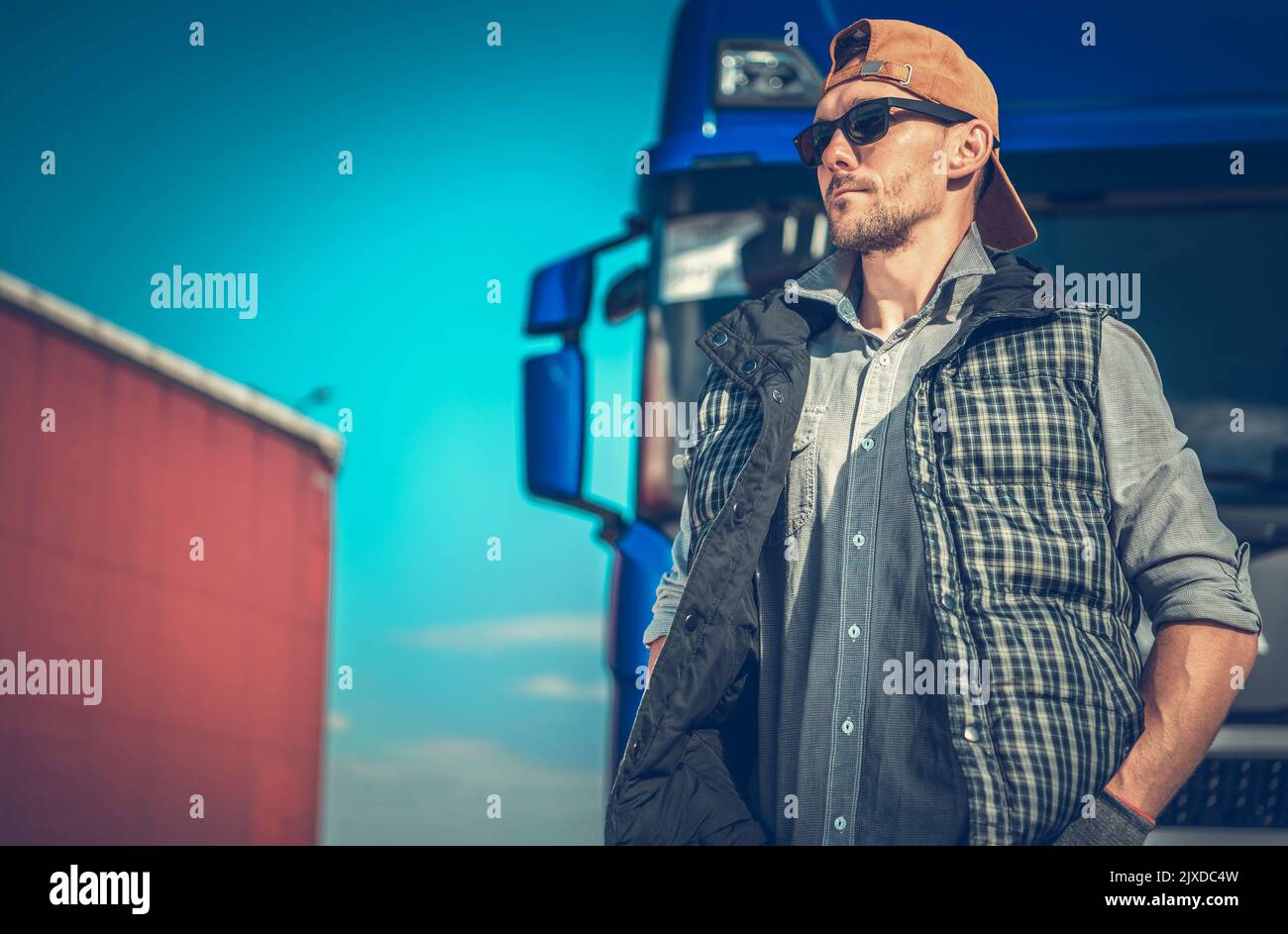 Caucasian Heavy Duty Semi-Trailer Truck Driver in His 40s Patiently ...