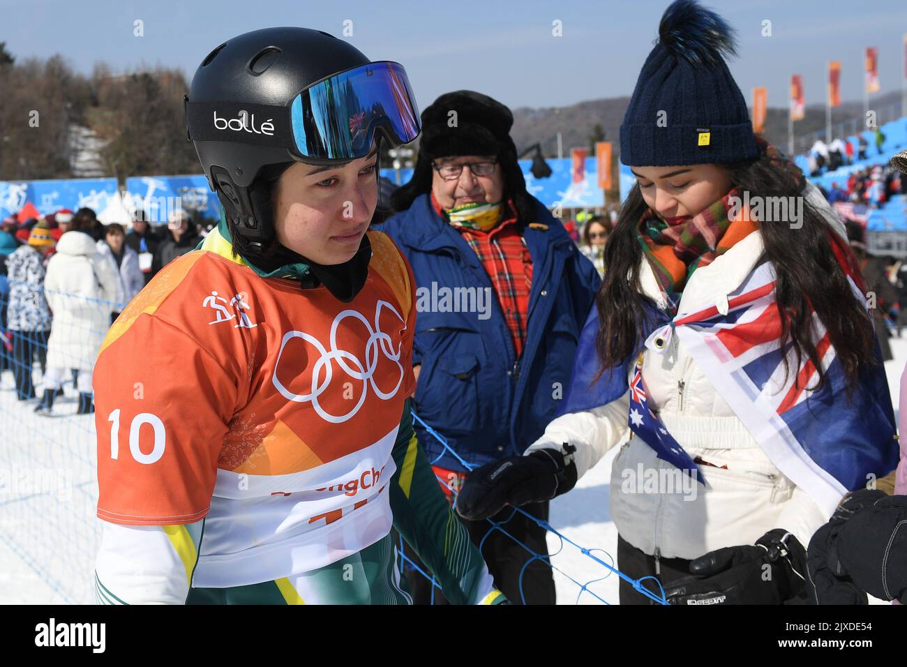 Belle Brockhoff of Australia speaks with her family following her run ...
