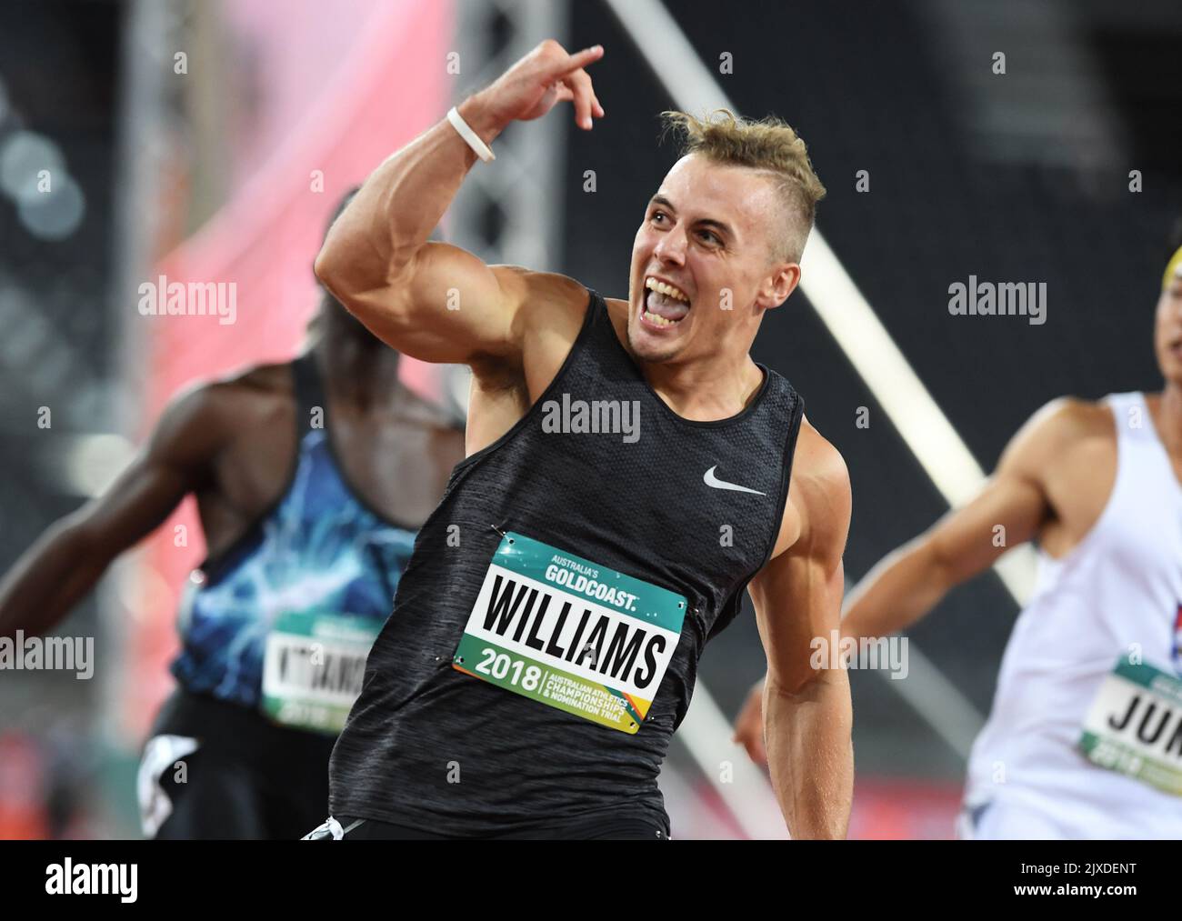 Trae Williams of Queensland reacts after winning the Mens 100m Final at ...