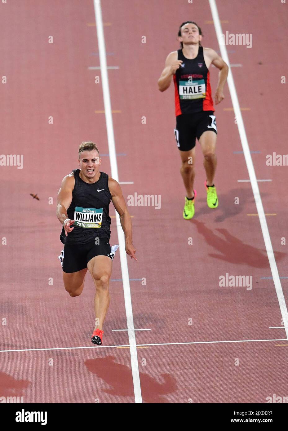 Trae Williams (left) of Queensland in action winning the men's 100 ...
