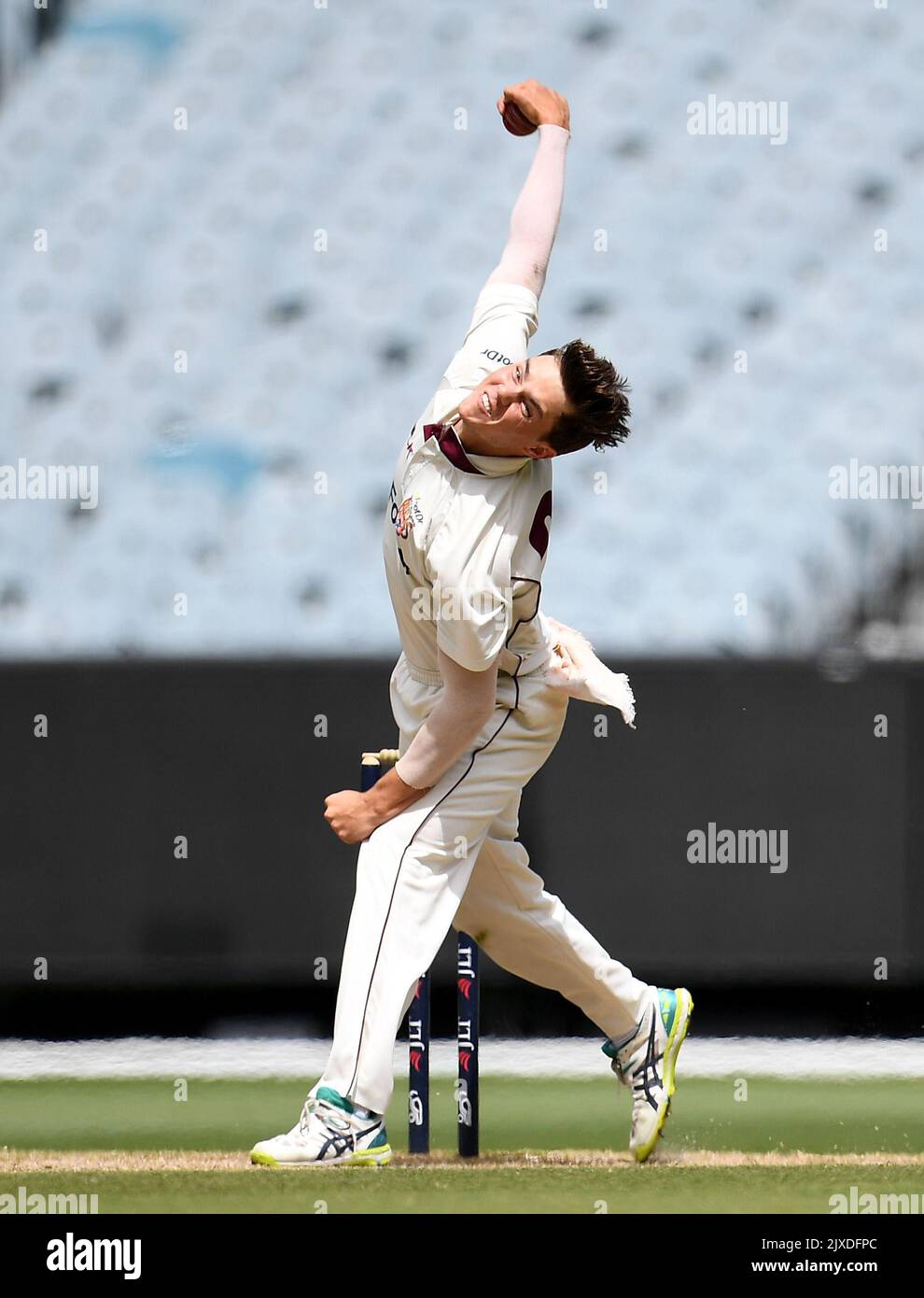 Mitchell Swepson of Queensland bowls during day two of the round 7 JLT ...