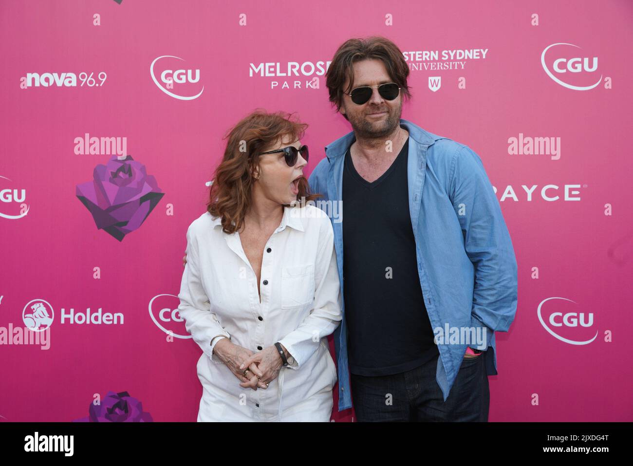 Susan Sarandon and John Polson are photographed on the black carpet ...