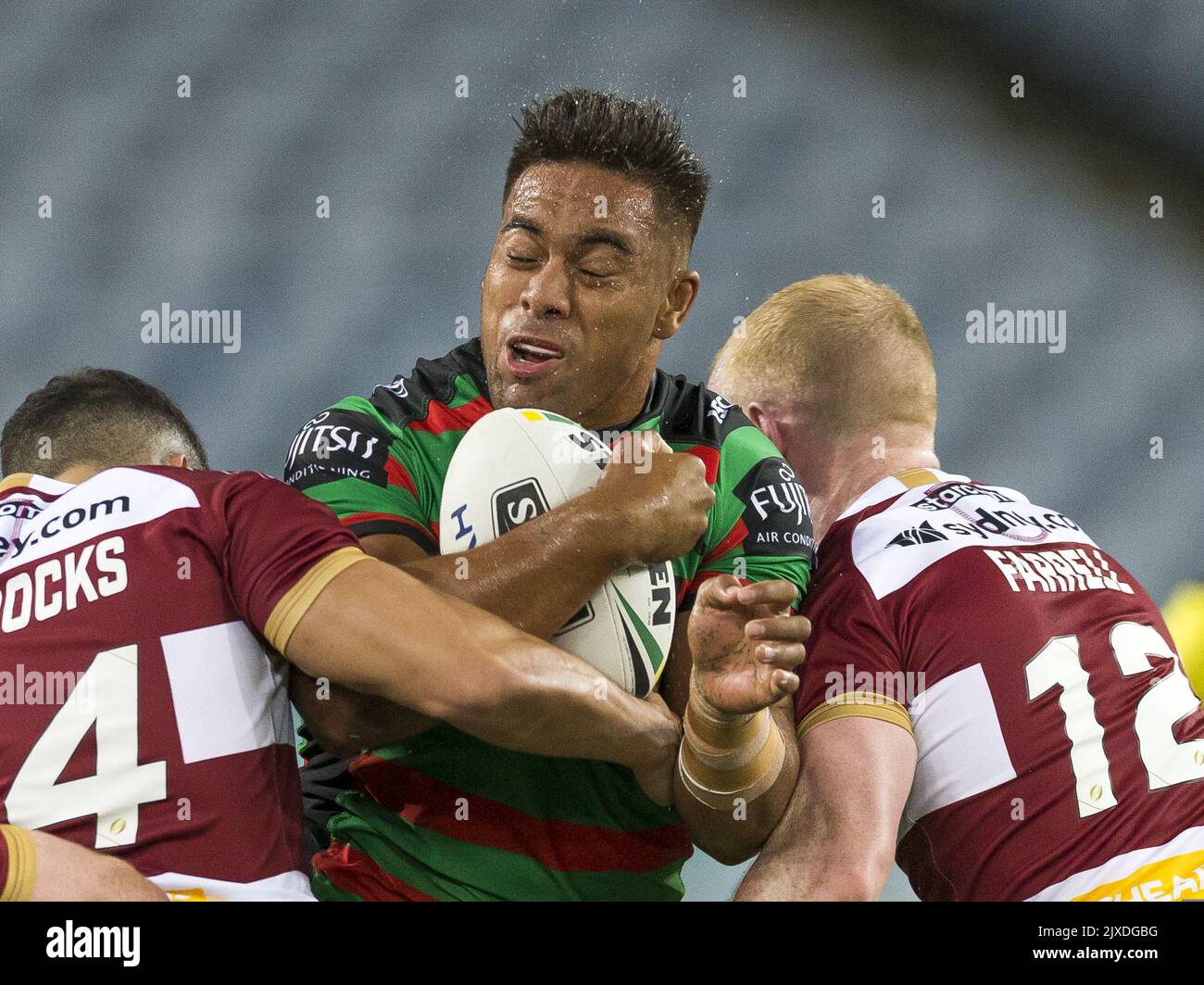 Junior Tatola of the Rabbitohs is tackled during the NRL International ...