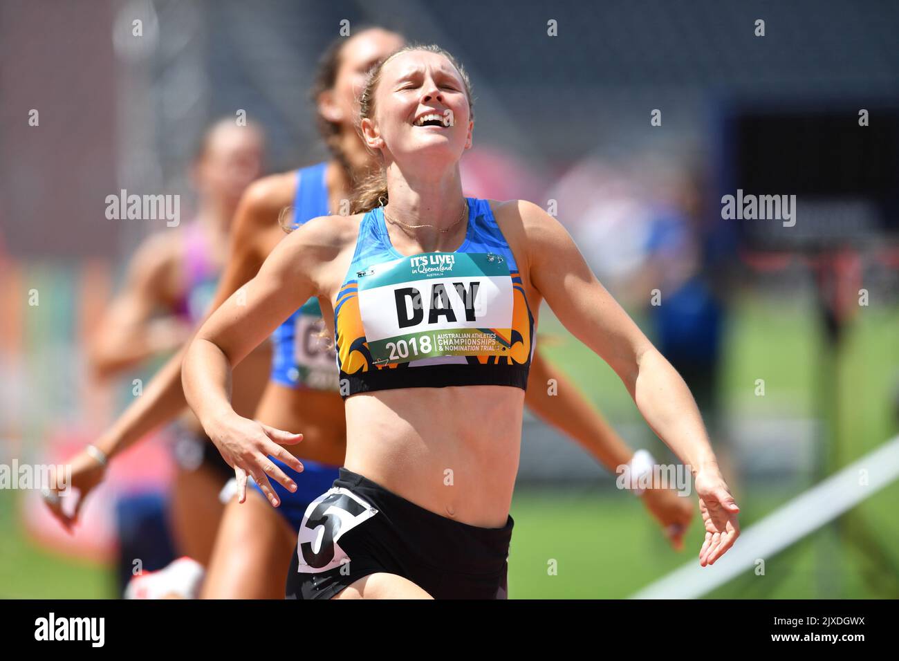 Riley Day of Queensland celebrates winning the womens 200 metres final ...