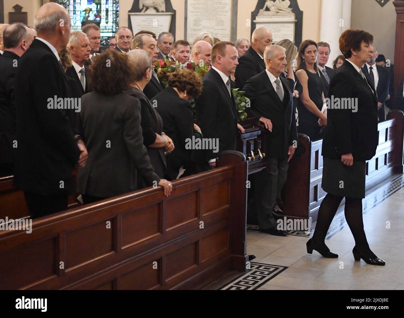 The coffin carrying Sir Nicholas Michael Shehadie is carried into at St ...