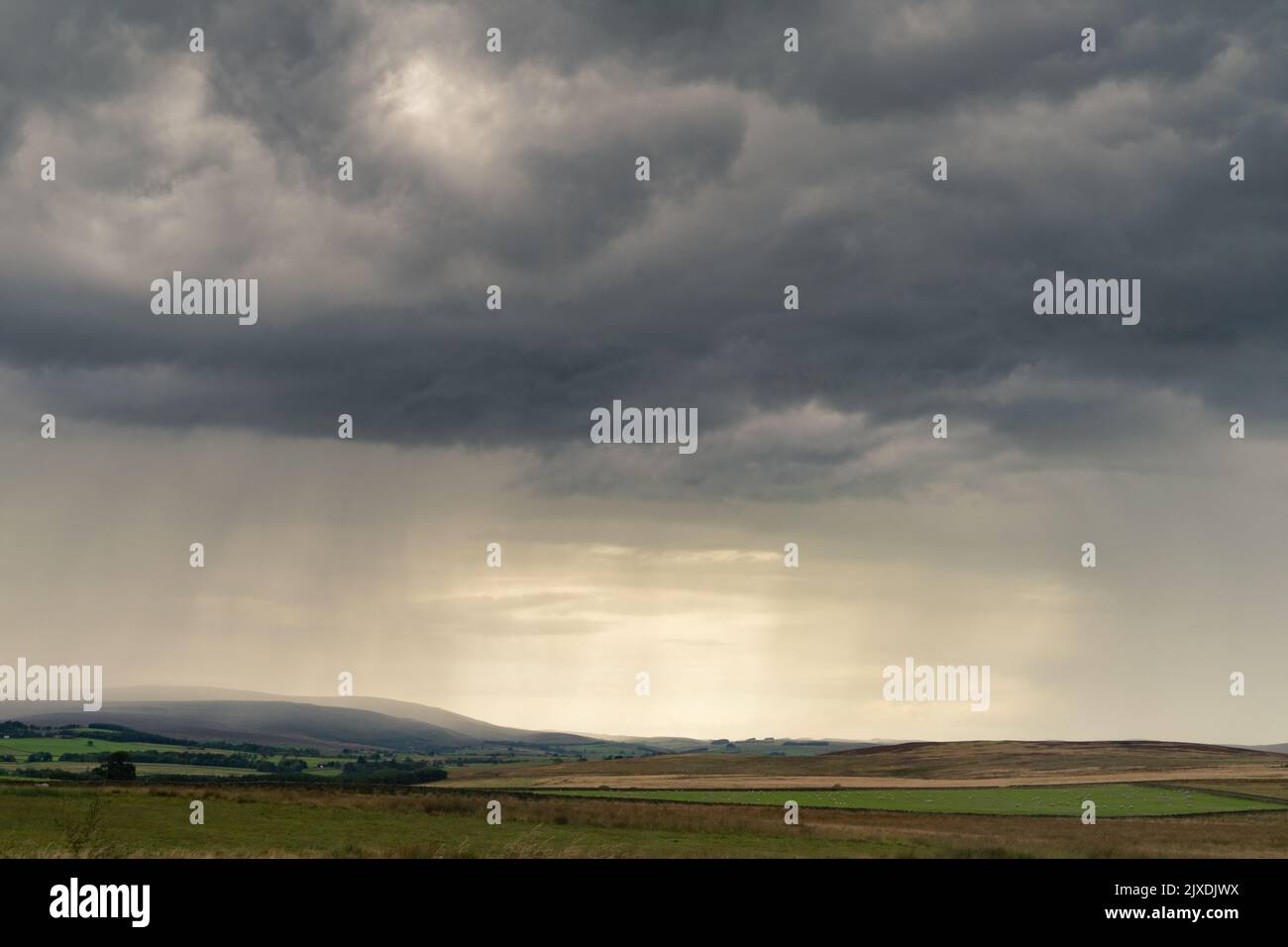 Dramatic clouds during a summer storm in Northumberland, UK Stock Photo ...