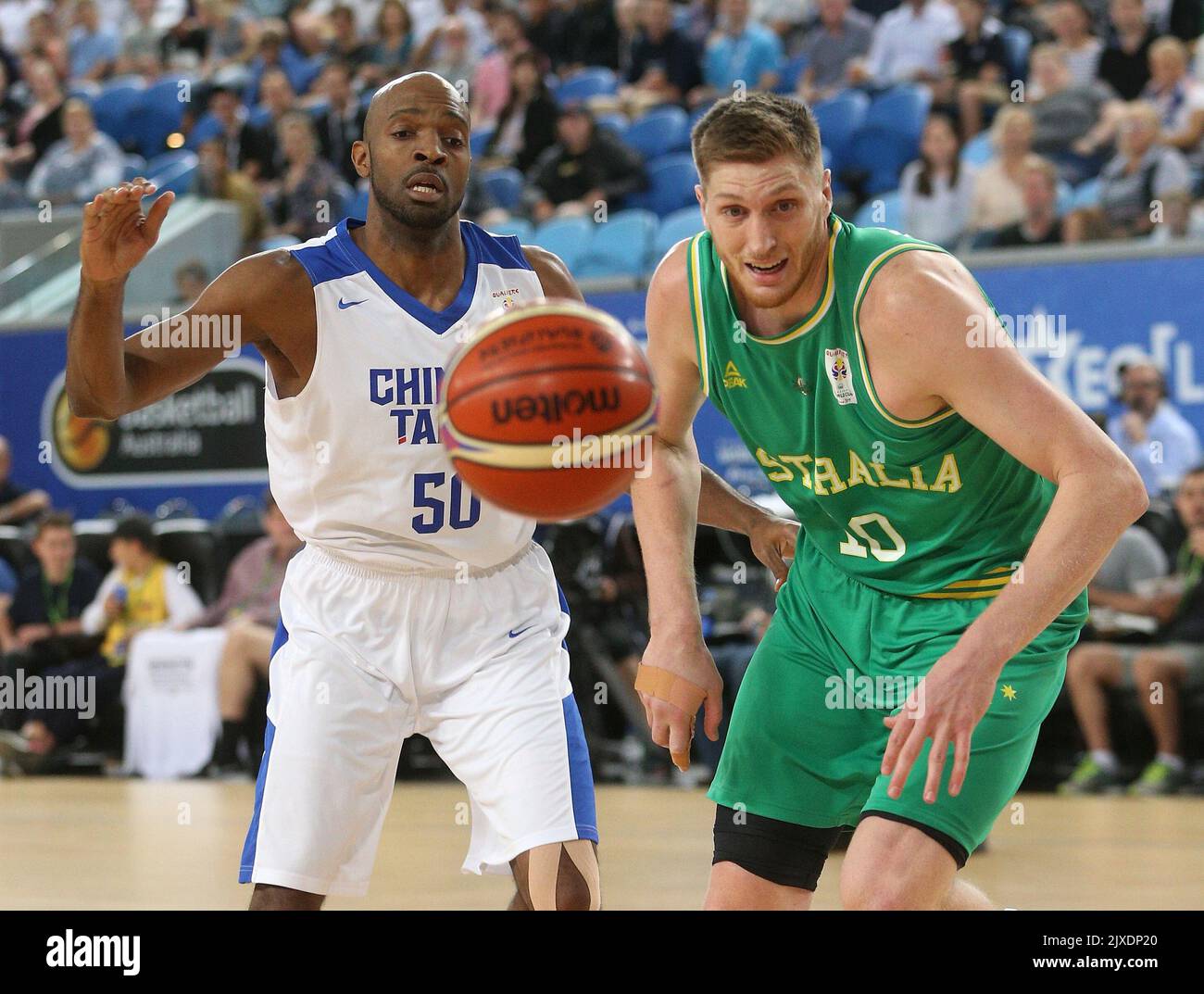 Quincy Spencer Davis (left) of Chinese Taipei contests with Matthew ...