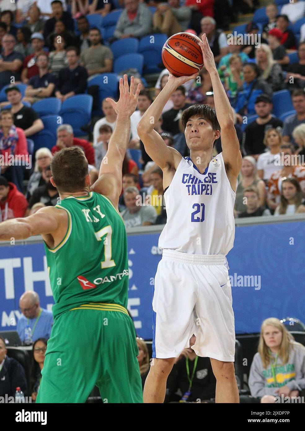Po-Hsun Chou of Chinese Taipei shoots over Nicholas Kay of Australia ...