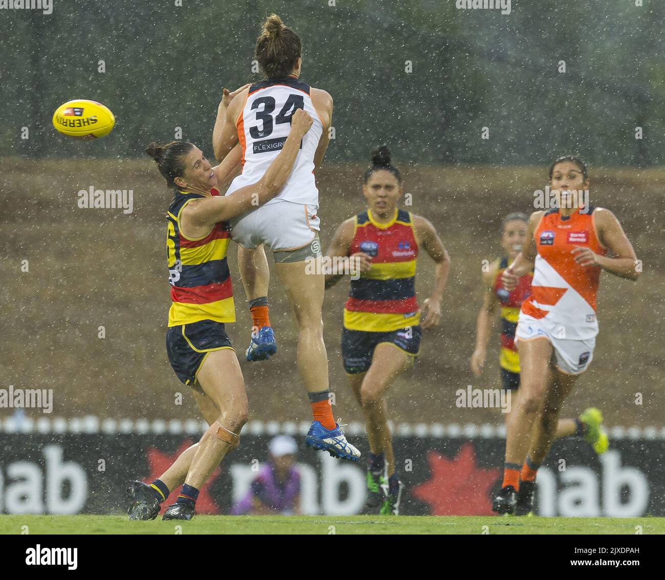 Chelsea Randall of the Crows tackles Jacinda Barclay of the Giants ...