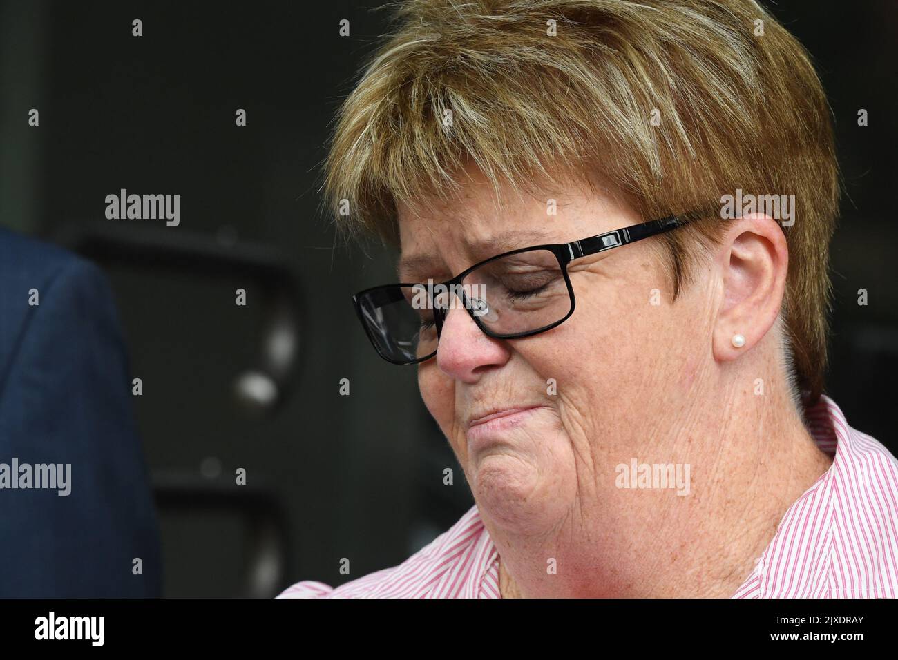 Cathy Perrin, mother of Michaela Perrin, addresses the media outside of ...