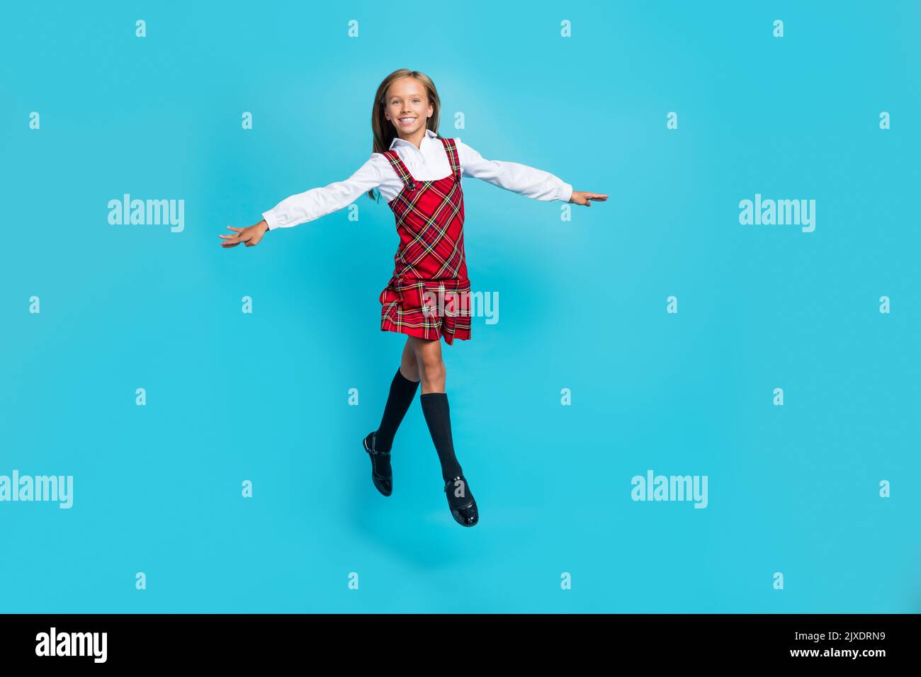 Full size photo of active lovely girl jumping arms wings flying ...