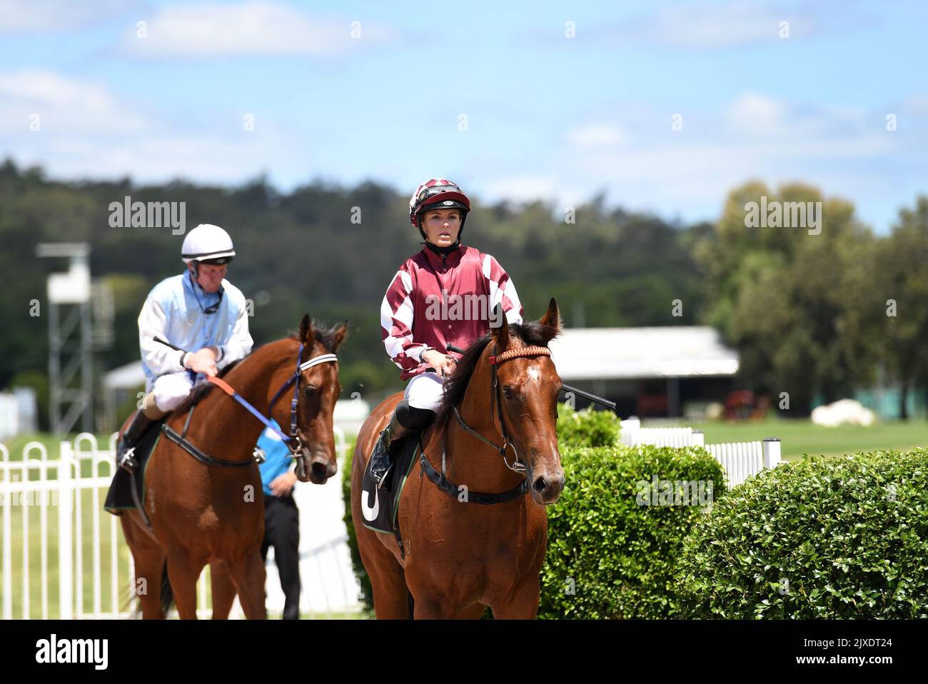 Jockey Emma Ljung (right) returns to scale after riding Aileach to win ...
