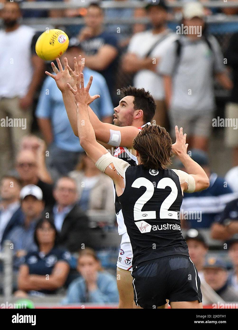Paddy McCartin of the Saints (left) marks during the AFL JLT Community ...