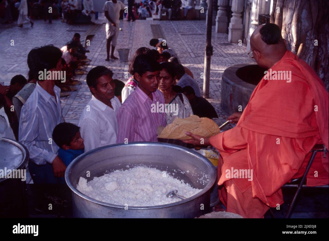 Food distribution by iskon temple hi-res stock photography and images ...