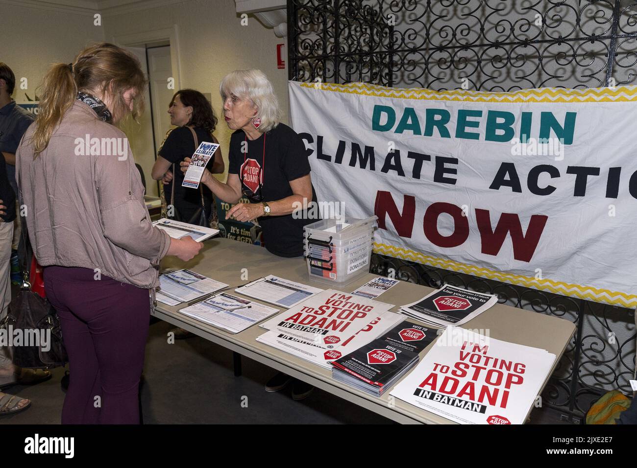 Climate activists are seen during a Batman candidates forum at the ...
