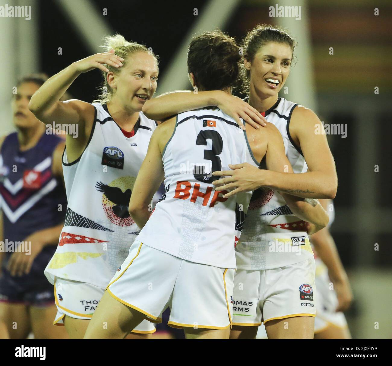 Crows players celebrate winning the Round 6 AFLW match between the ...
