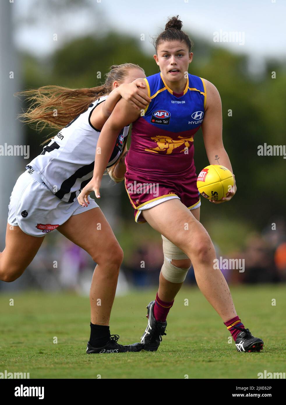Isabella Ayre (right) of the Lions in action during the Round 6 AFLW ...