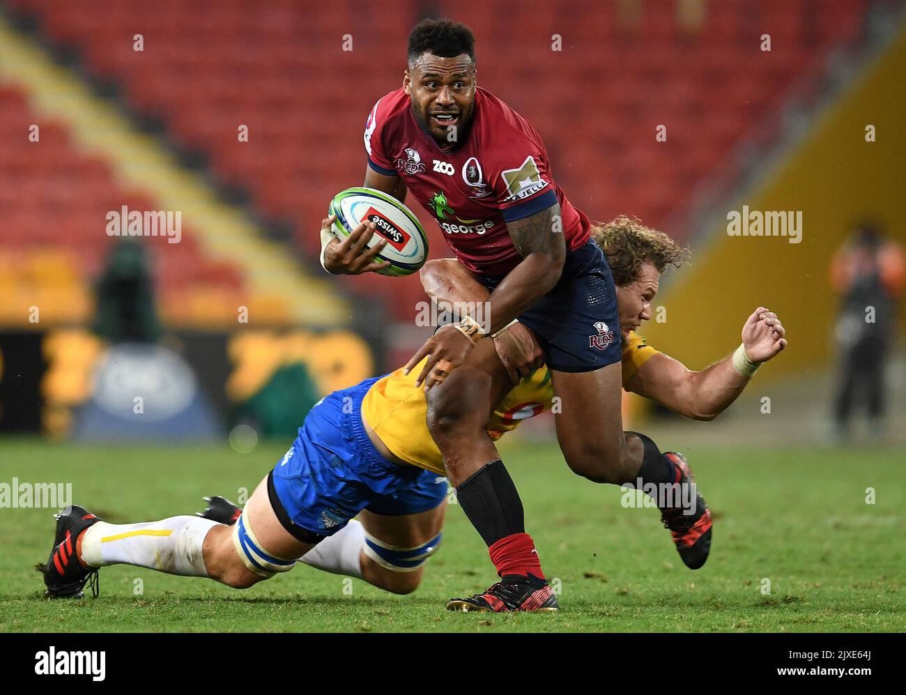 Same Kerevi of the Reds (left) is tackled by RG Snyman of the Bulls ...