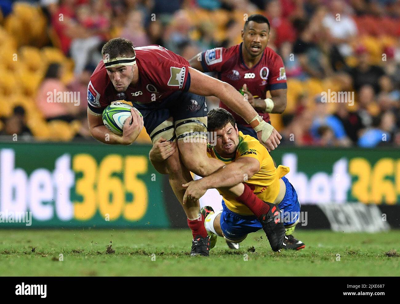 Izack Rodda of the Reds (left) is tackled by Marco van Staden of the ...