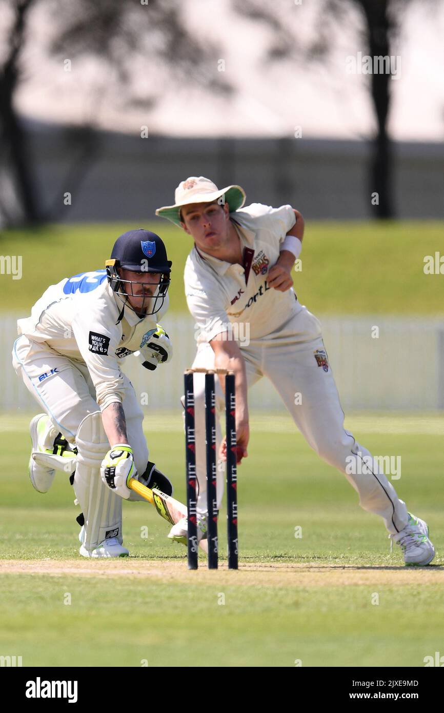 Nic Maddinson of NSW runs in safe despite the efforts of Jack ...