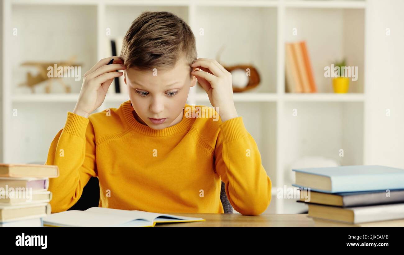 Tensed kid hi-res stock photography and images - Alamy